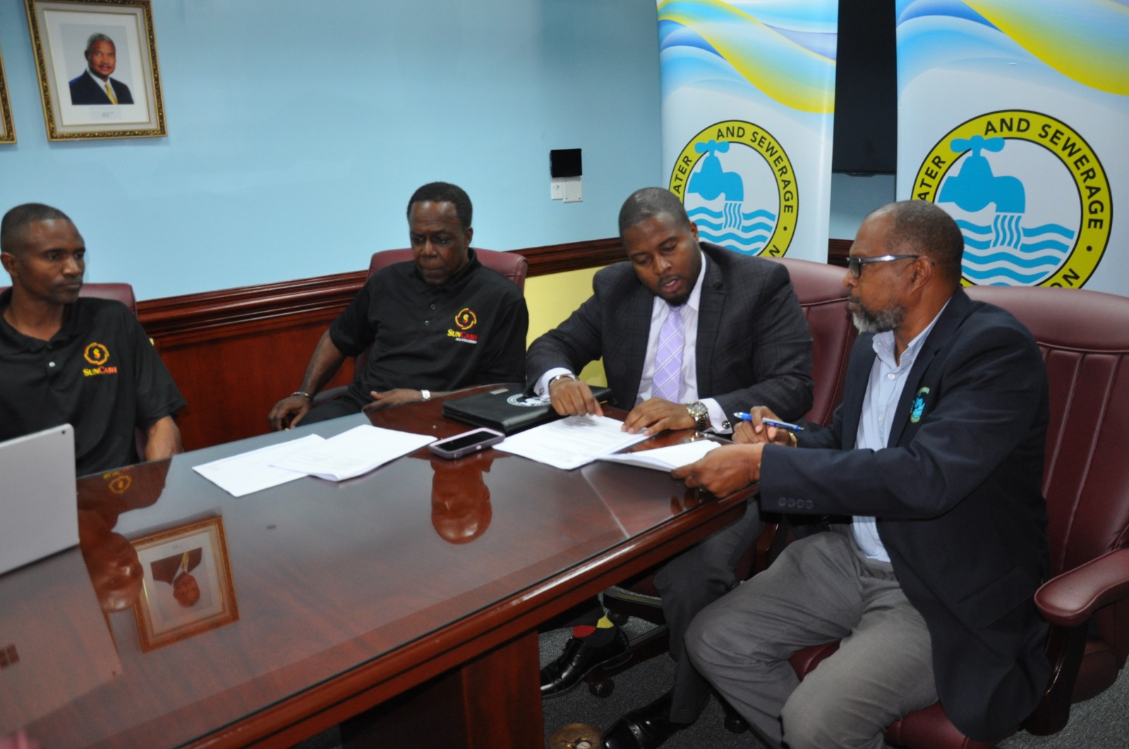 SunCash & WSC Contract Signing - Water & Sewerage Corporation